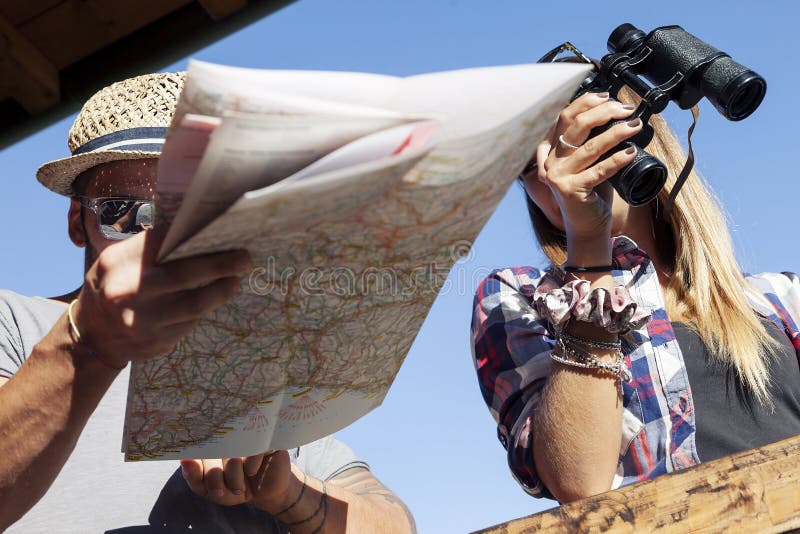 Group of Young Hikers Looking at Map Stock Photo - Image of caucasian ...