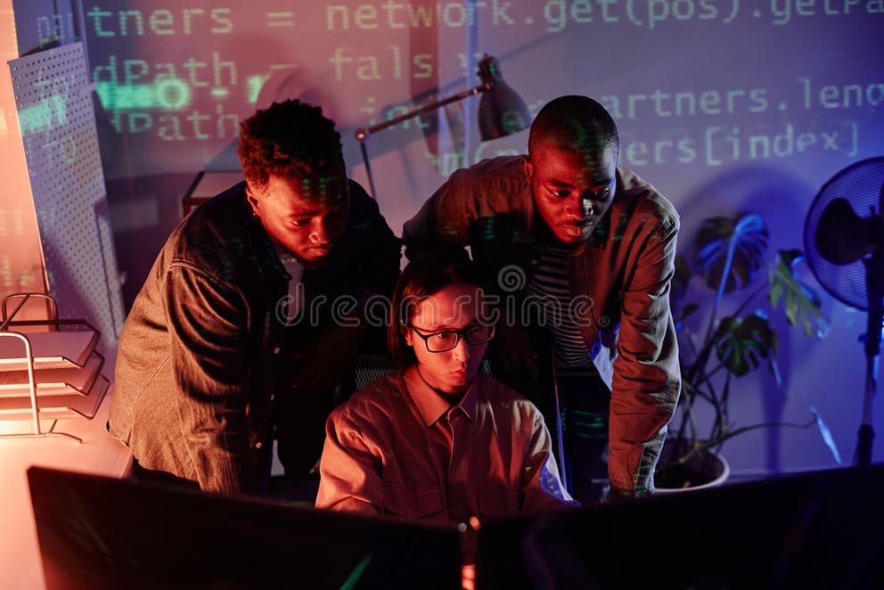 Group of Young Intercultural Programmers Bending in Front of Computer ...