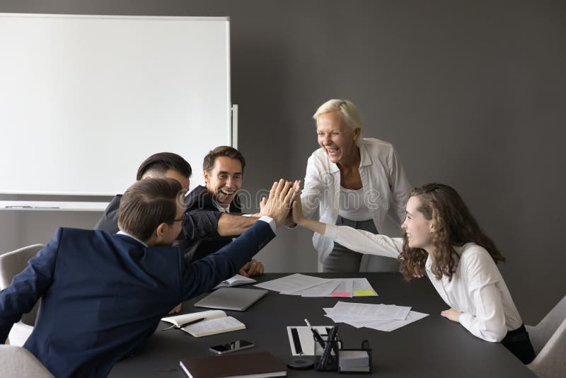 Group of Enthusiastic Executives Celebrate Successful Project ...