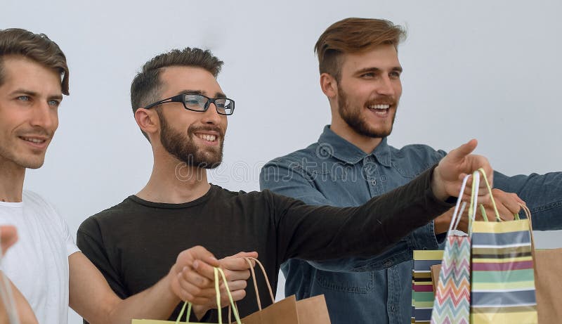 Group of Young Men with Shopping Bags Stock Image - Image of shop ...