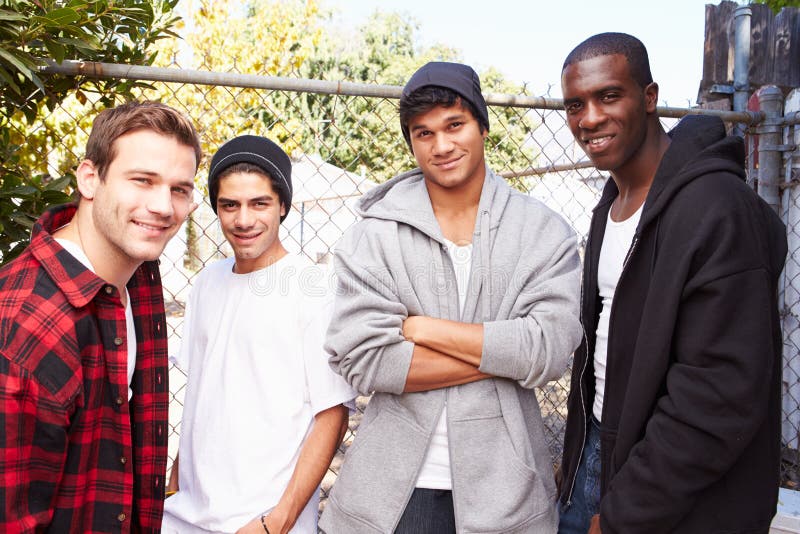 Group of Young Men in Urban Setting Standing by Fe Stock Photo - Image ...