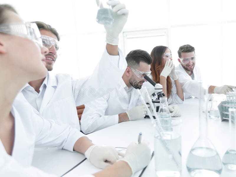 Young Microbiologists Working in the Laboratory. Stock Image - Image of ...