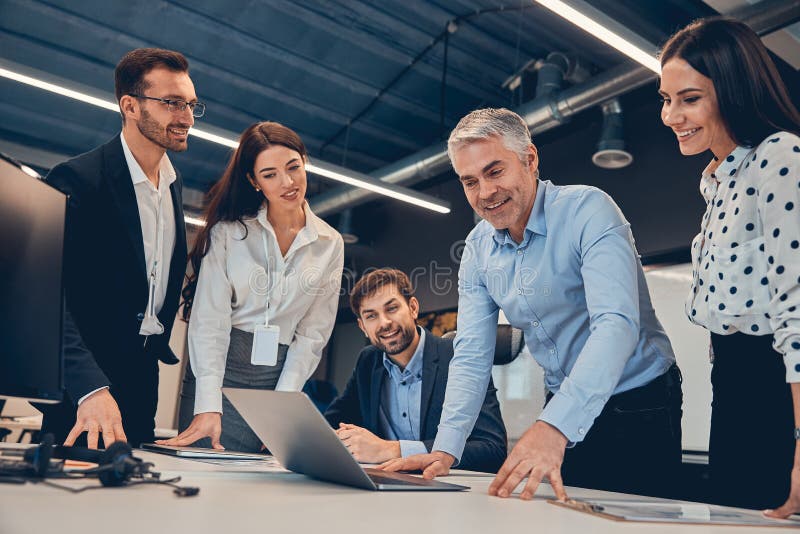 Group of Young Modern People in Formal Wear Communicating and Using ...