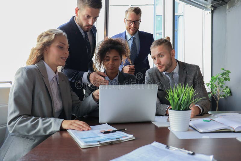 Group of Young Modern People in Formalwear Smiling and Discussing ...