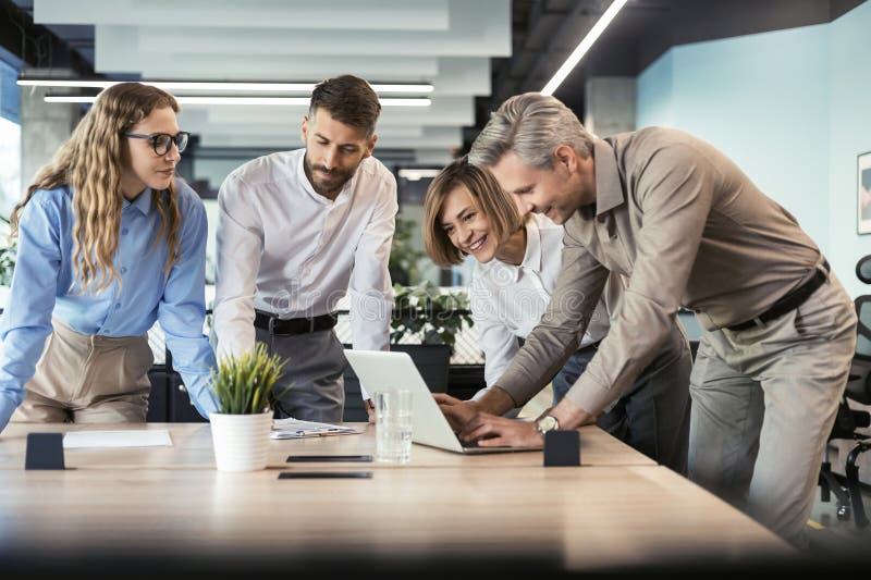 Group of Young Modern People in Formalwear Using Modern Technologies ...