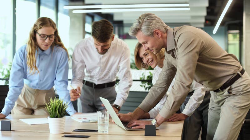 Group of Young Modern People in Formalwear Using Modern Technologies ...
