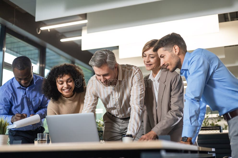 Group of Young Modern People Using Modern Technologies while Working in ...