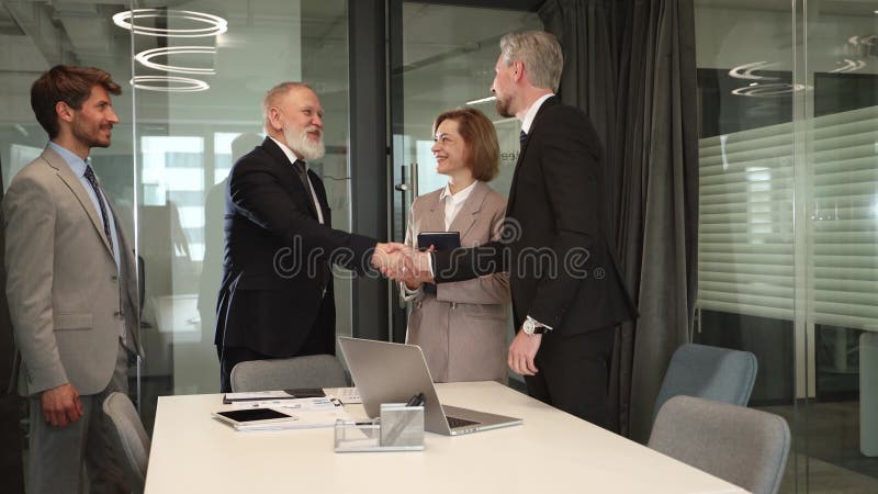 Group of Young Modern People Using Modern Technologies while Working in ...