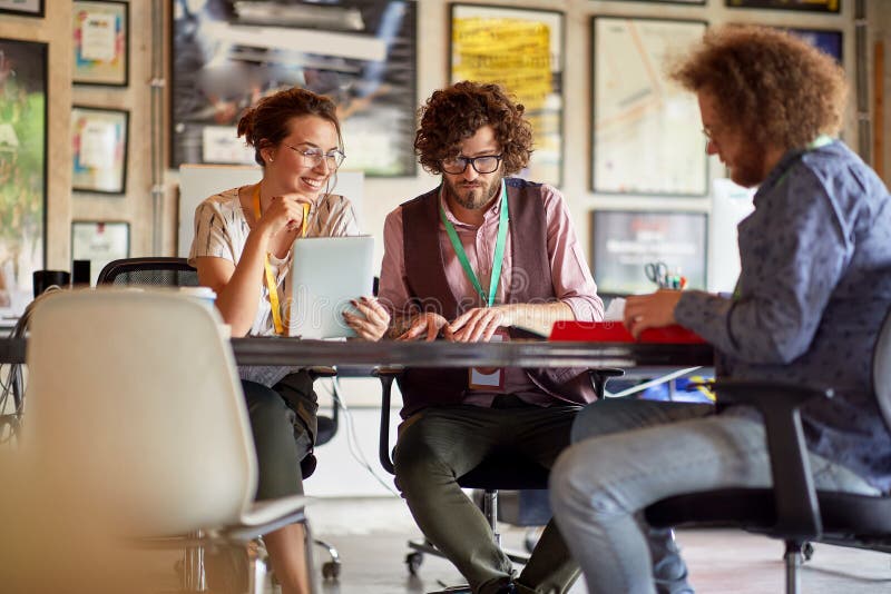 Group of Young Motivated Employees Working Together Stock Image - Image ...