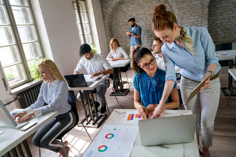 Group of Young Multi-ethnic Startup Business Team Collaborating on ...