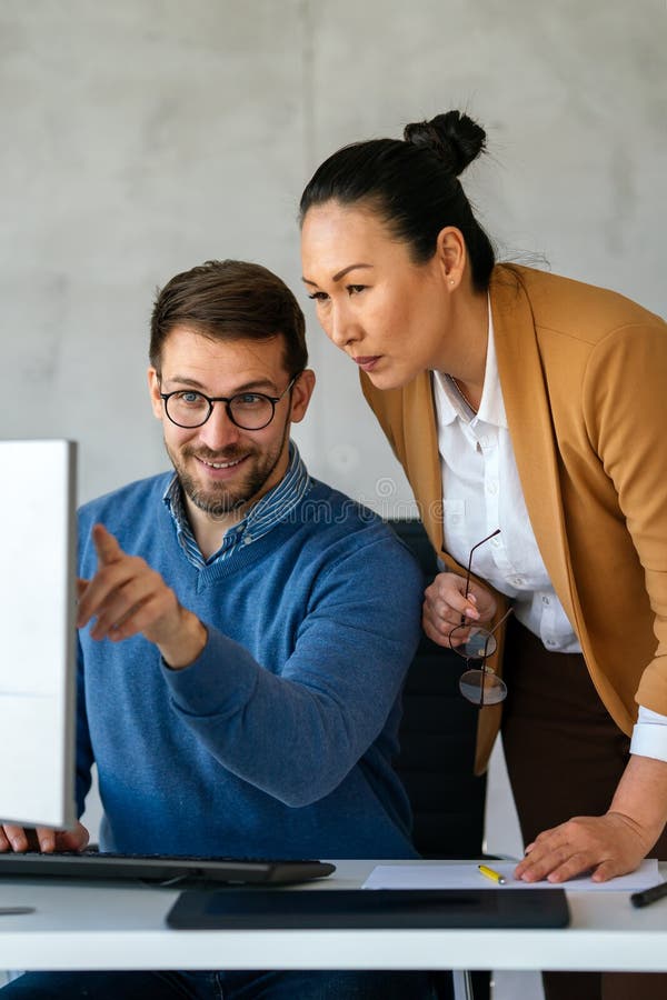 Group of Young Multi-ethnic Startup Business Team Collaborating on ...