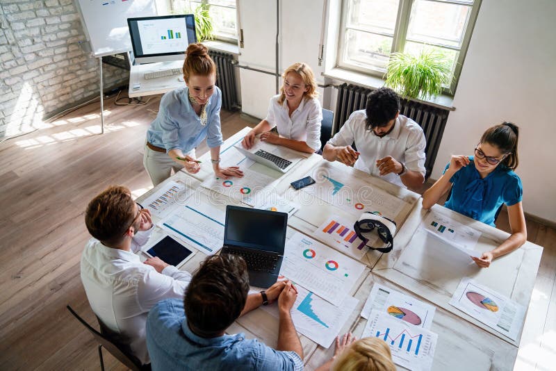 Group of Young Multi-ethnic Startup Business Team Collaborating on ...