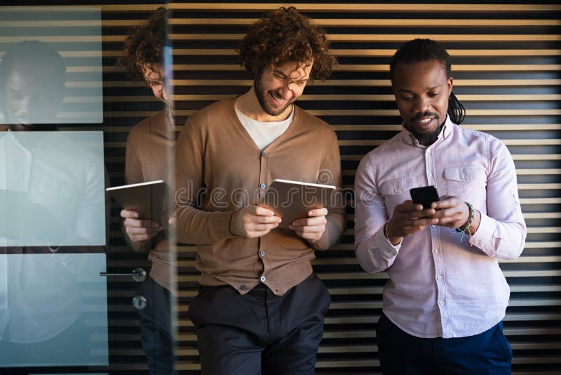 Group of Young Multi-ethnic Startup Business Team Collaborating on ...