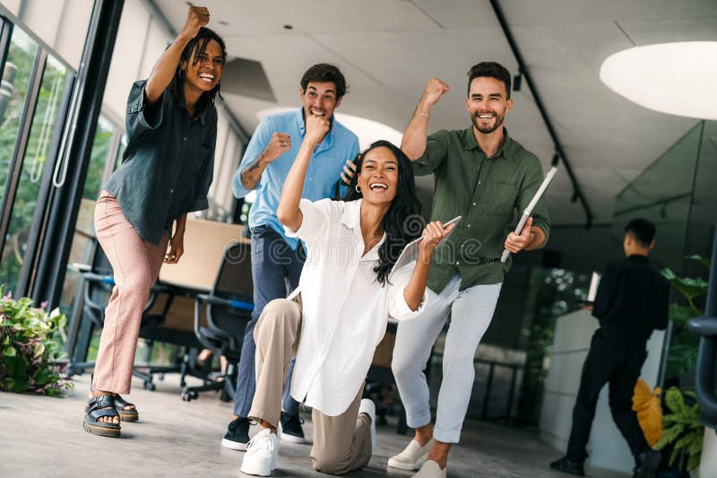 Group of Young Multi-ethnic Startup Business Team Collaborating on ...