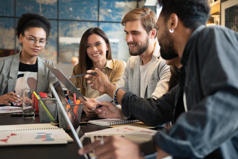 Group of Young Multiracial People Working in Modern Office. Businessmen ...