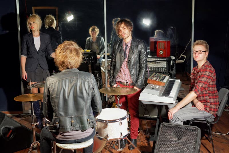 Group of Young Musicians in Studio Stock Image - Image of playing ...