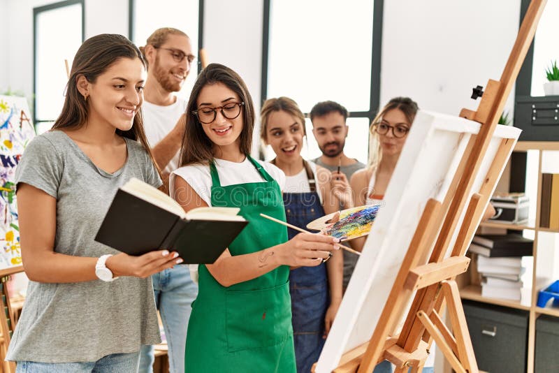 Group of Young Paint Students Smiling Happy and Looking Draw of Partner ...