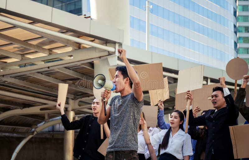 Group Of Young People Activists Is Protesting With Placards And Posters