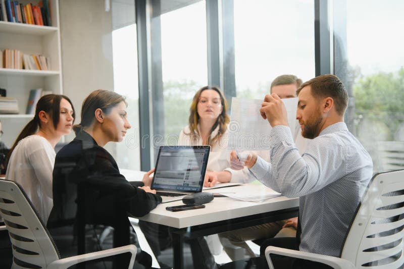 Group of Young People in Business Meeting Stock Photo - Image of office ...