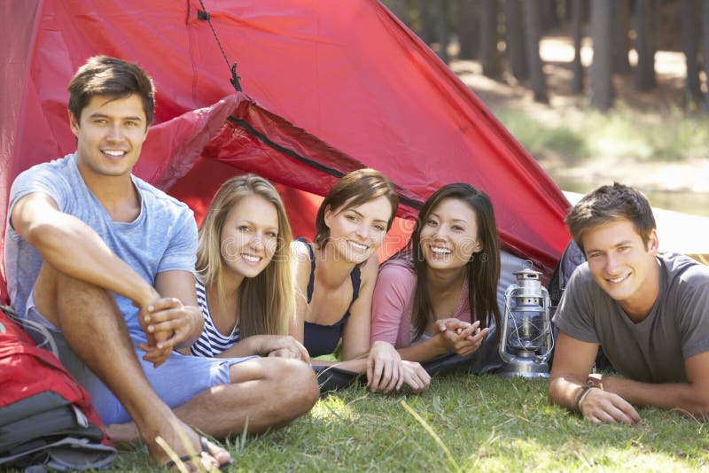 Group of Young People on Camping Holiday Together Stock Photo - Image ...