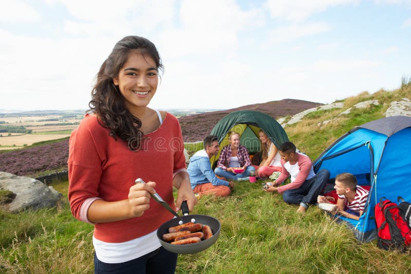 Group of Young People on Camping Trip in Countryside Stock Image ...