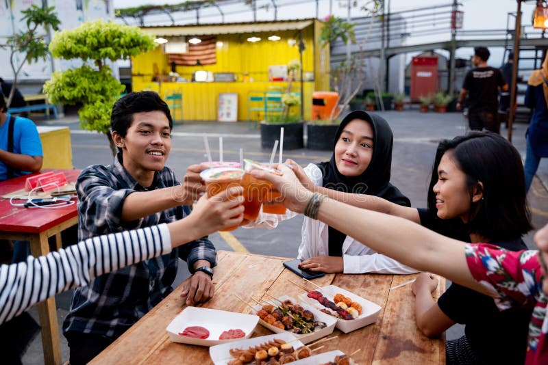Group of Young People Cheers Drinks Stock Photo - Image of pretty, meal ...