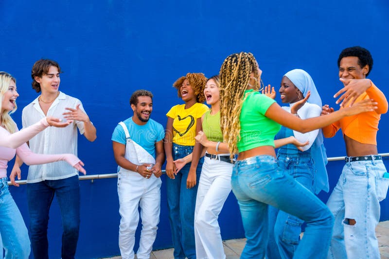 Group of Multi-ethnic Young People Dancing Together Outdoors Stock ...