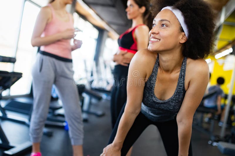 Group of Young People Doing Exercises in Gym Stock Image - Image of ...