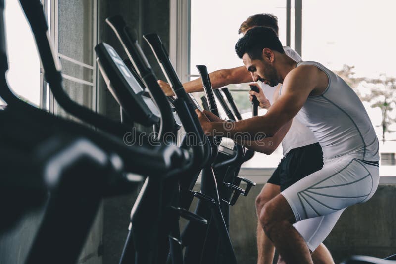 Group of Young People Doing Exercises in Gym Stock Photo - Image of ...