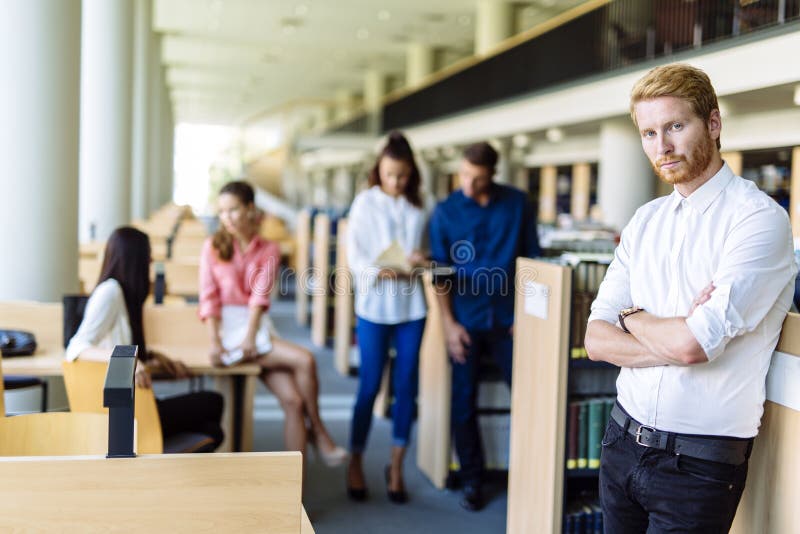 Group of Young People Educating Themselves in a Library Stock Image ...