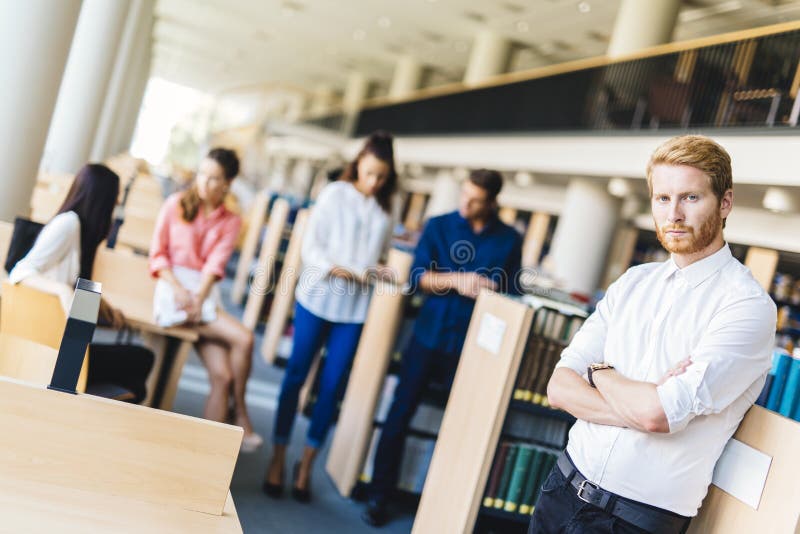 Group of Young People Educating Themselves in a Library Stock Photo ...