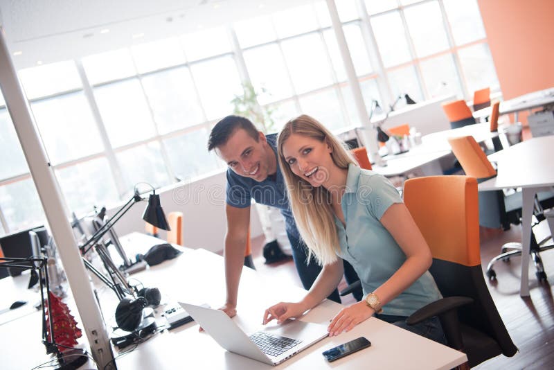 Co-Workers With Computer stock photo. Image of business - 10545458