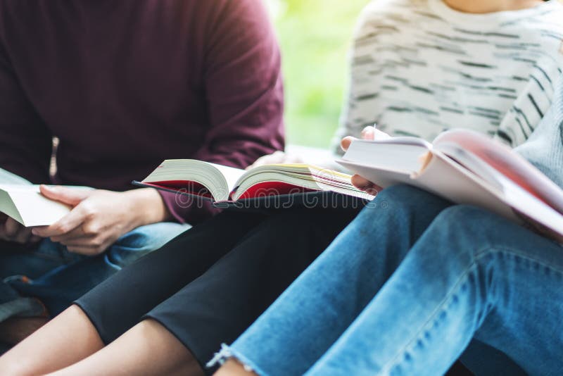Group of Young People Enjoyed Reading Books Together Stock Photo ...