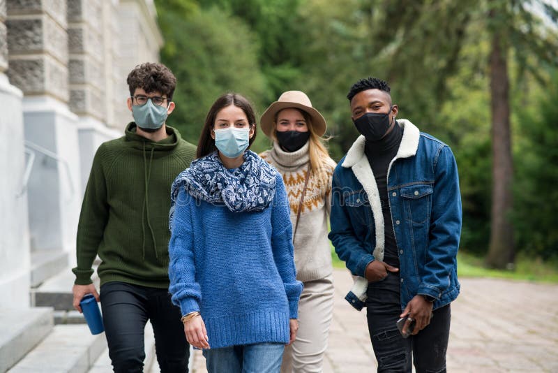Group of Young People with Face Mask Outdoors in Town, Walking ...