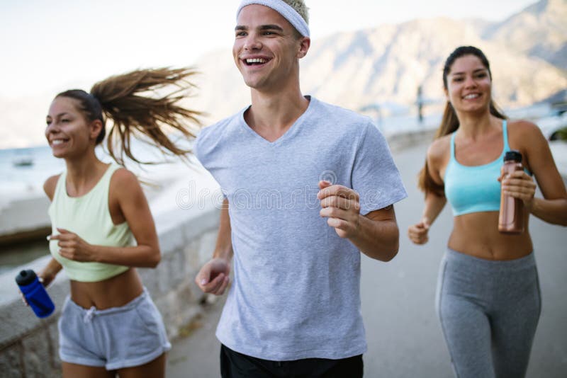 Group of Young People Friends Running Outdoors at Seaside Stock Image ...