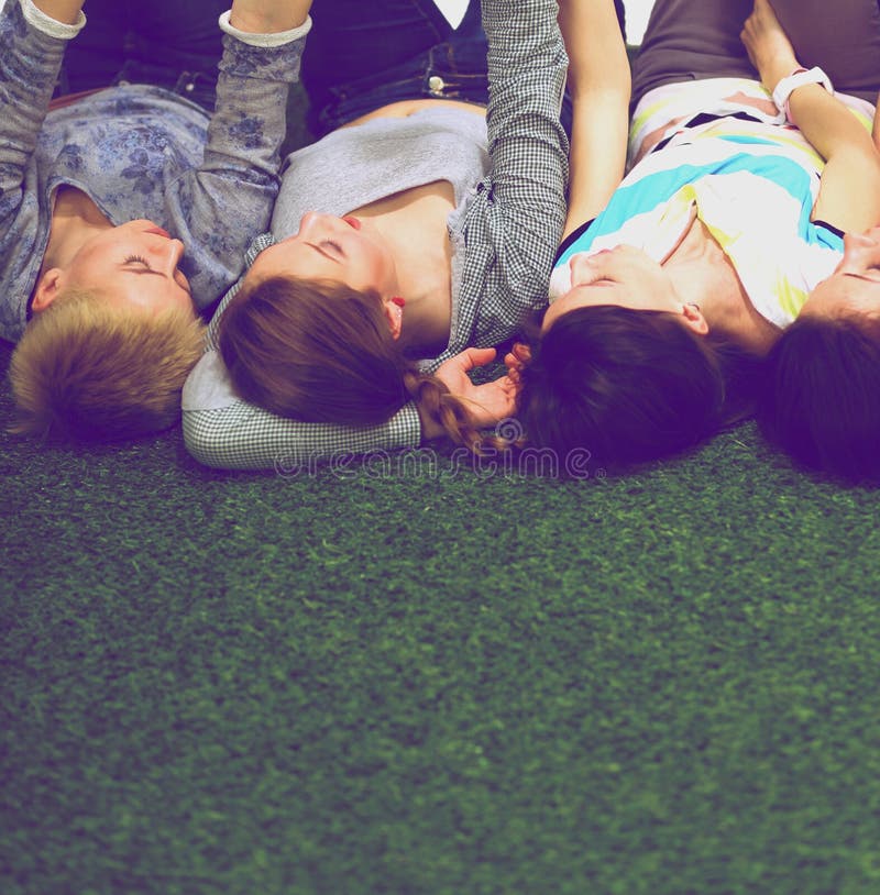 Group of Young People Having Fun in Grass Stock Photo - Image of love ...