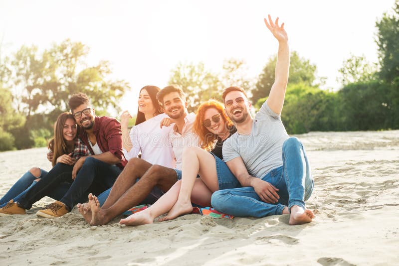 Group of Young People Having Fun Outdoors on the Beach Stock Photo ...