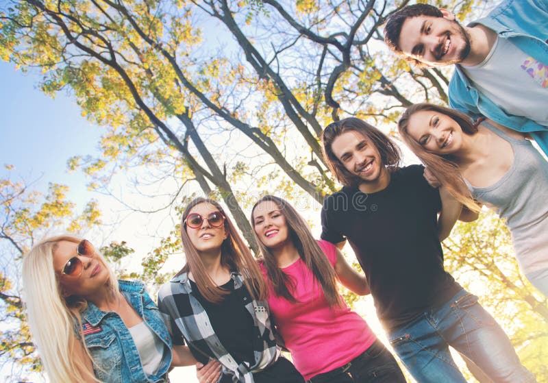 Group of Young People Having Fun Outdoors Stock Image - Image of park ...
