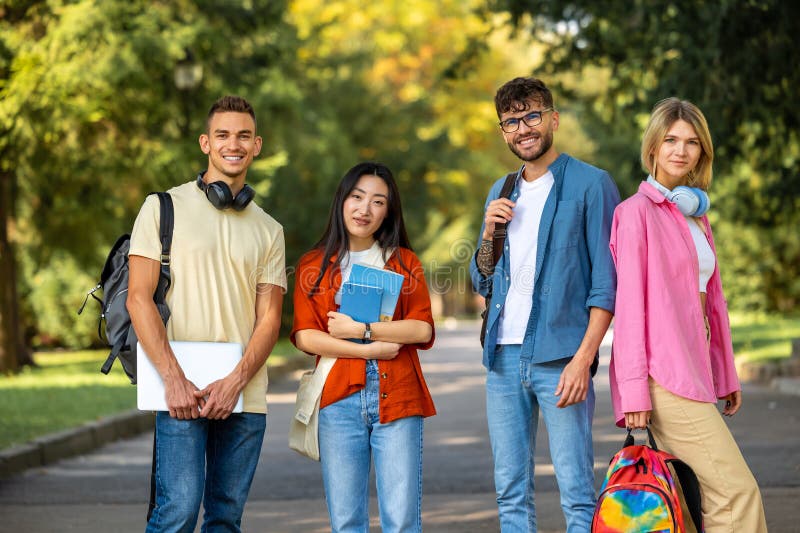 Group of Young People Having a Walk in the Park Stock Photo - Image of ...