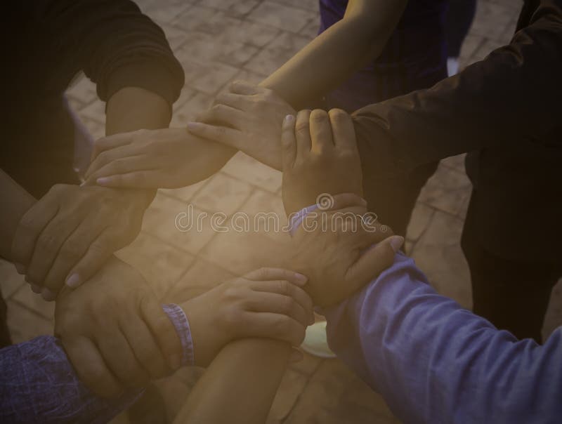 Group of Young People Holding in Hands Teamwork Together Stock Photo ...
