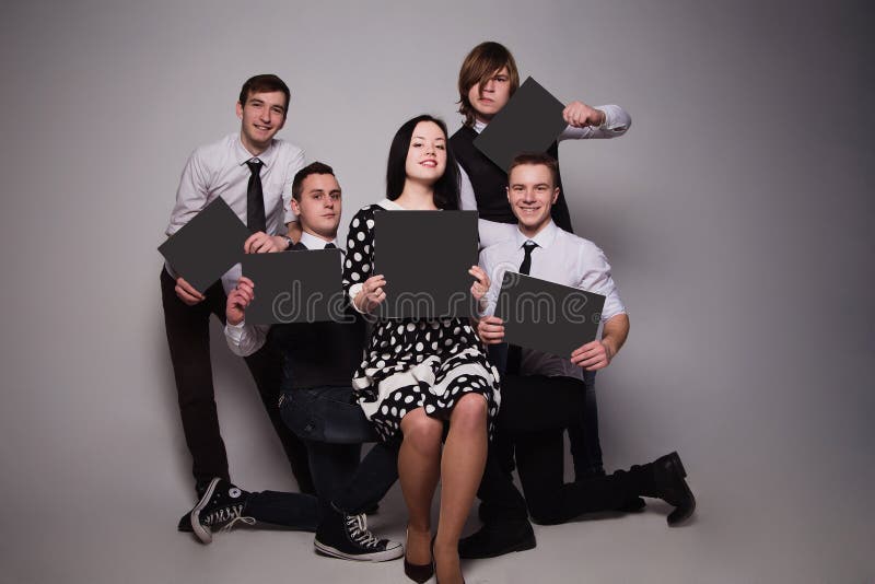 Group of Young People Holding Sheets of Paper Stock Image - Image of ...