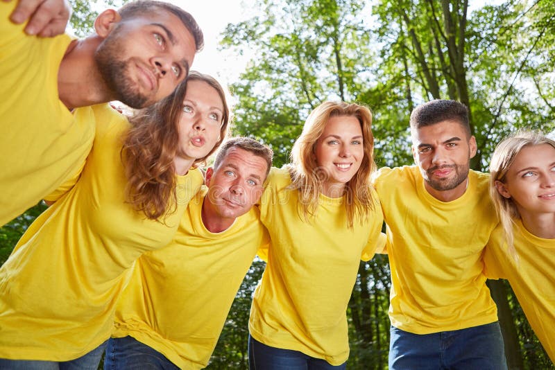 Group of Young People Hugs Each Other in the Workshop Stock Image ...