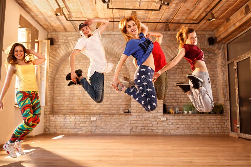 Group of Young People Jumping Together Stock Image - Image of cool ...