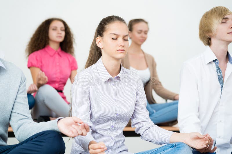 Group of Young People Meditating Stock Image - Image of collar ...