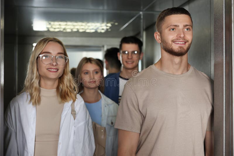 Group of Young People in Modern Elevator Stock Photo - Image of male ...