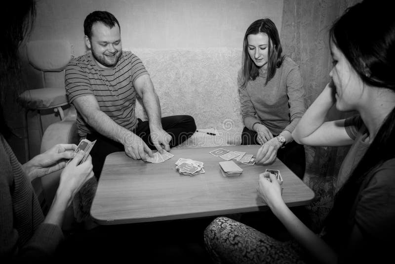Group of Young People Playing Cards Stock Image - Image of evening ...