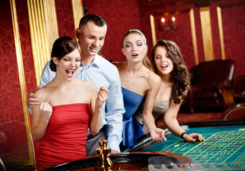 Group of Young People Playing Roulette Stock Image - Image of club ...