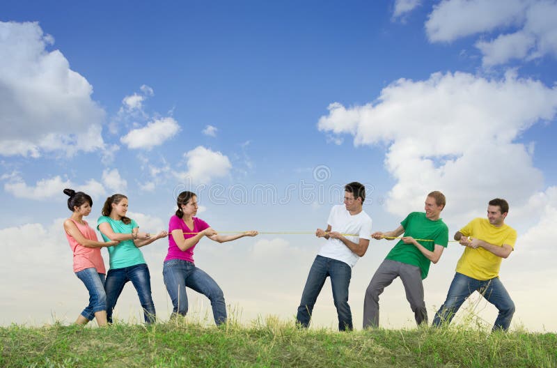 Group of Young People Pulling a Rope Stock Photo - Image of competing ...