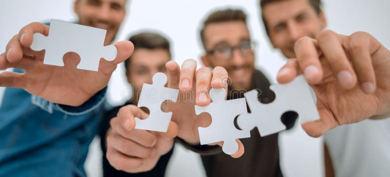 Group of Young People with Puzzle Pieces Stock Photo - Image of group ...