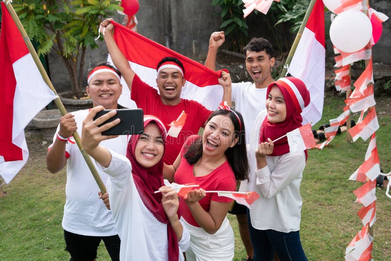 Group of Young People in Red and White Clothes Stock Image - Image of ...